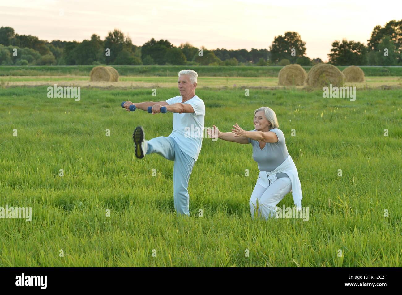senior couple doing exercises Stock Photo - Alamy