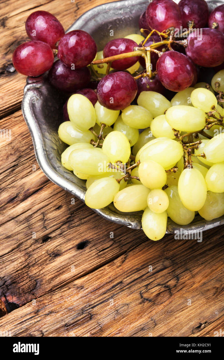 Ripe large grapes on a stylish dish Stock Photo - Alamy