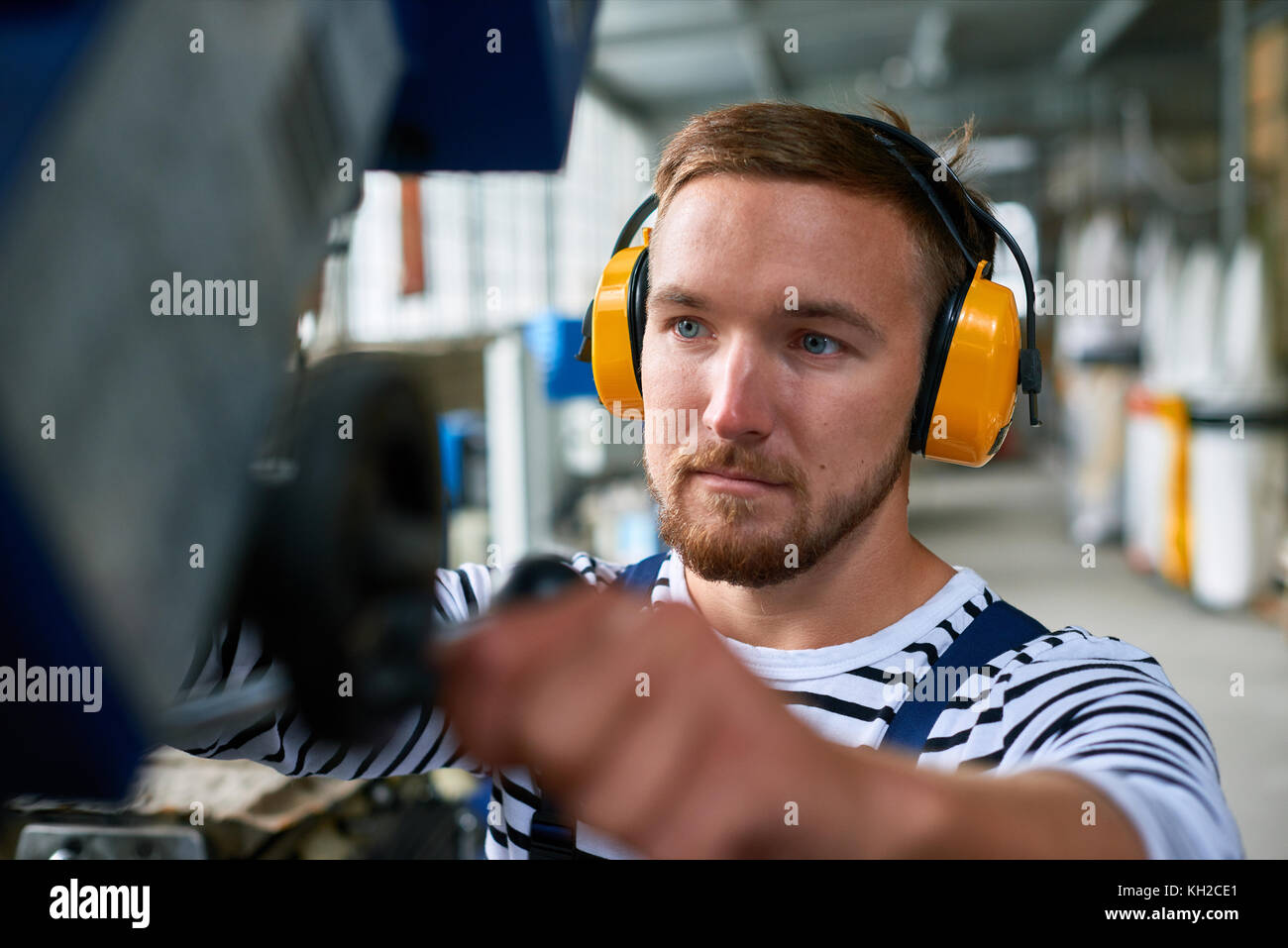 Man pressing buttons on machine hi-res stock photography and images - Alamy