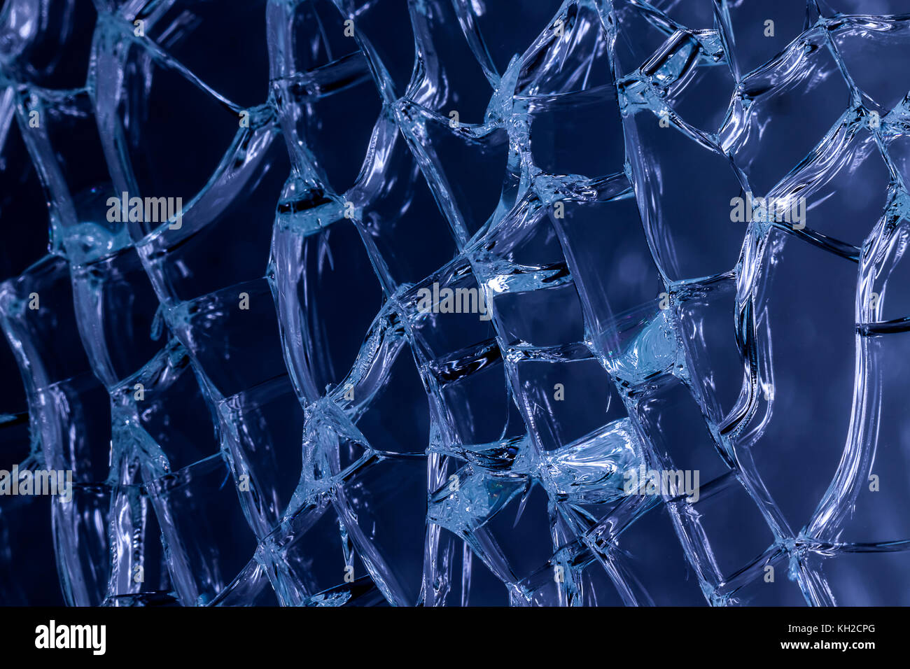 Shattered glass macro close up shot Stock Photo - Alamy