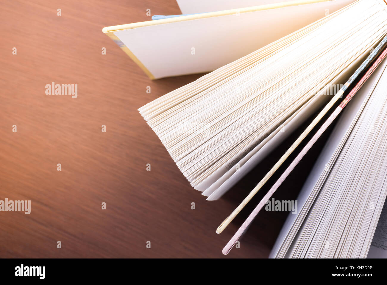 book open on the table to the library Stock Photo - Alamy