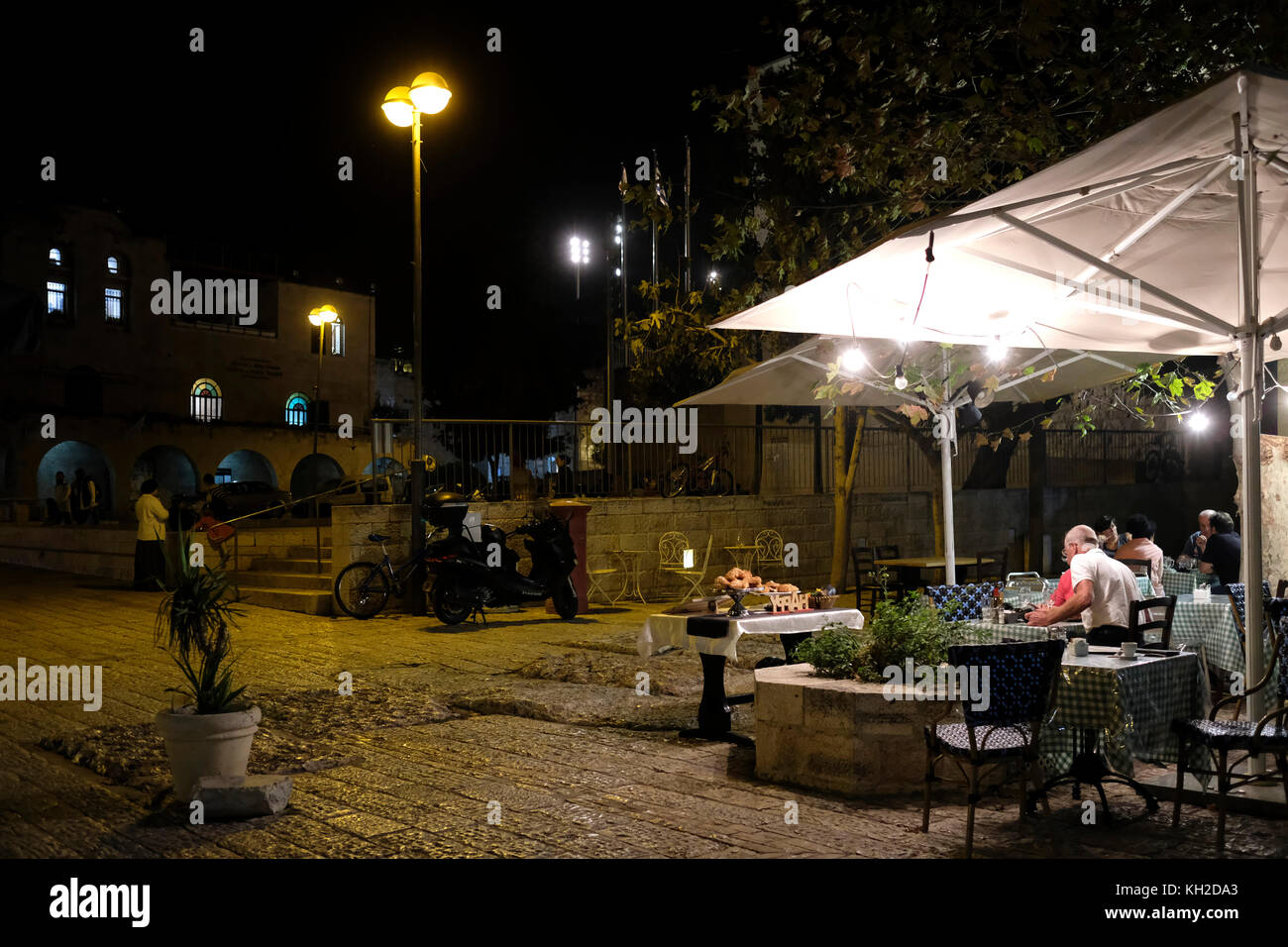 People sitting in a coffee house in Hurva square at the Jewish Quarter ...