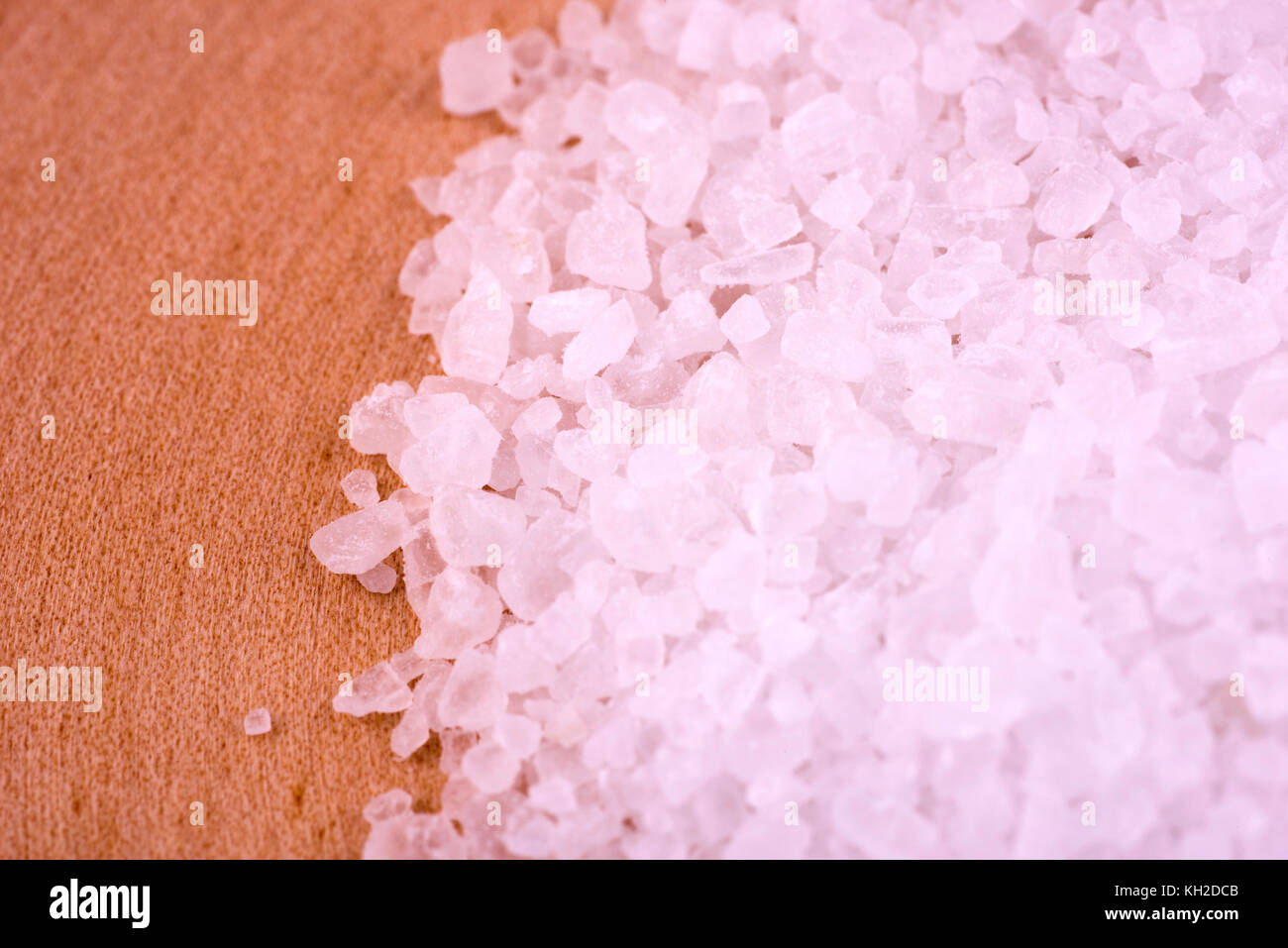 large granules of sea salt closeup background Stock Photo - Alamy