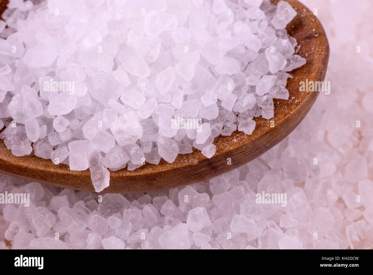 large granules of sea salt closeup background Stock Photo - Alamy