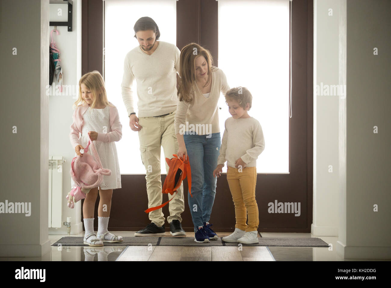 Happy boy coming home from hi-res stock photography and images - Alamy