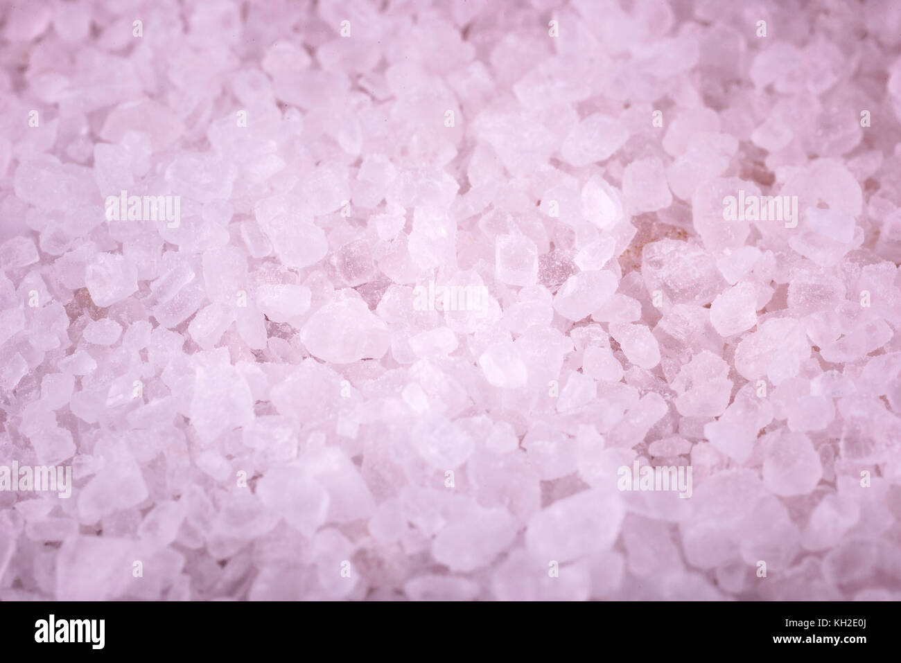 large granules of sea salt closeup background Stock Photo - Alamy