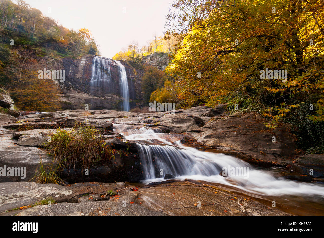 Waterfall scenery with autumn foliage landscape Stock Photo - Alamy