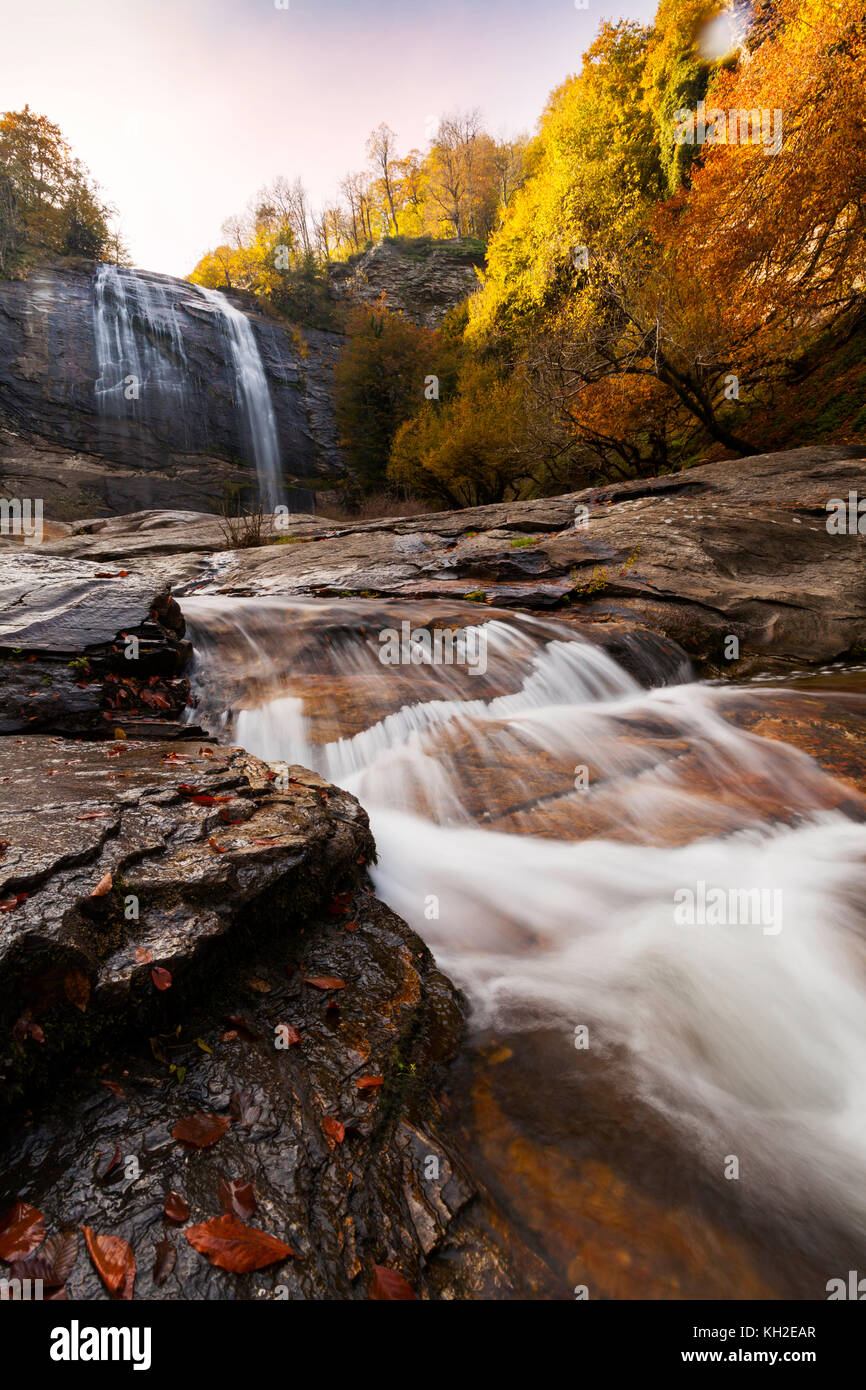 Waterfall scenery with autumn foliage landscape Stock Photo - Alamy