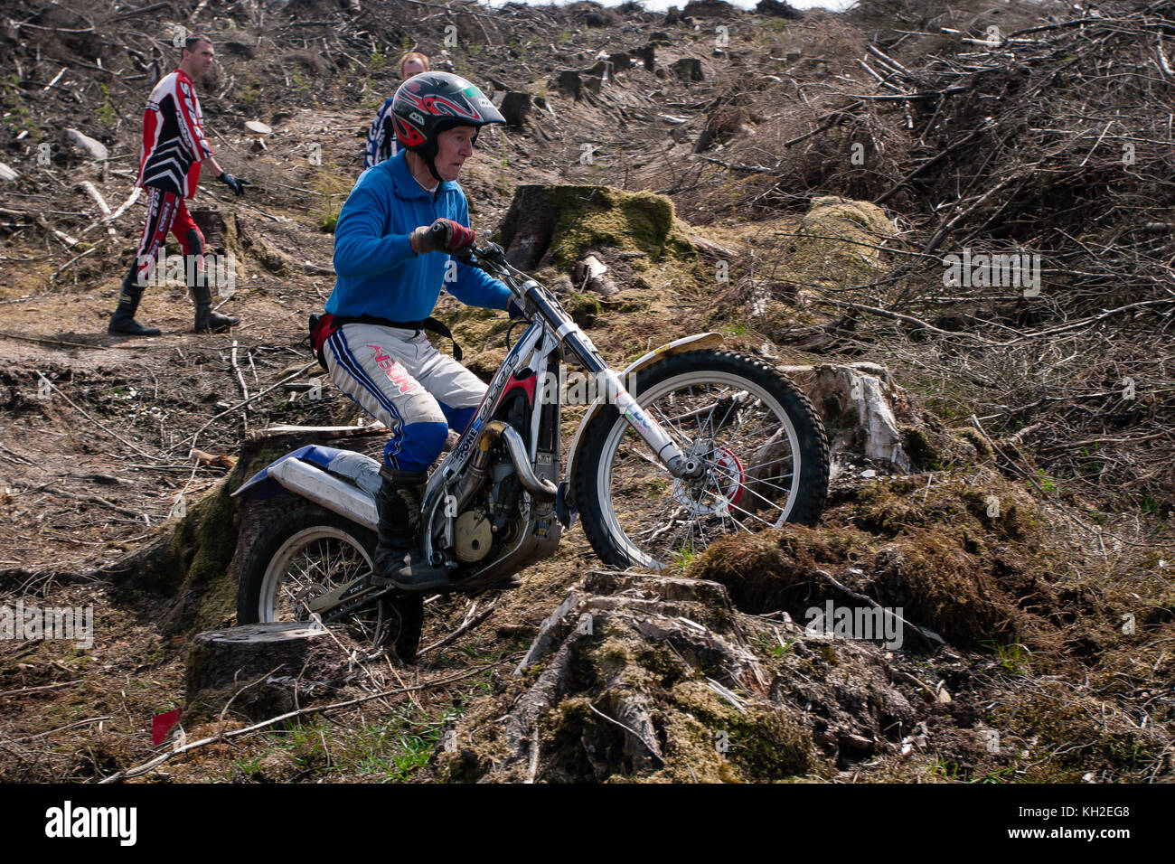 Motorcross bike rider on a cross trail showing of skills on a difficult ...