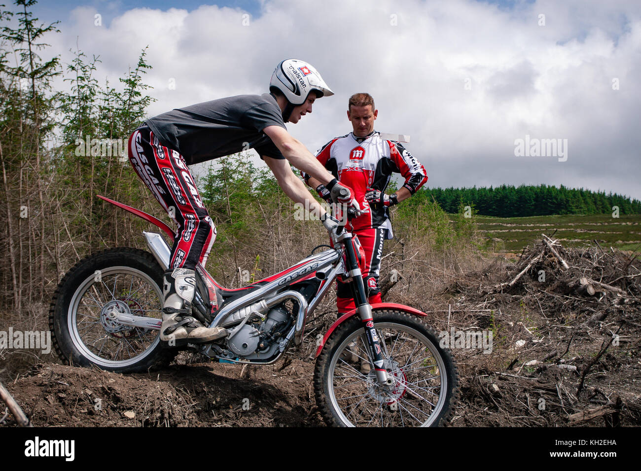 Motorcross bike rider on a cross trail showing of skills on a difficult ...