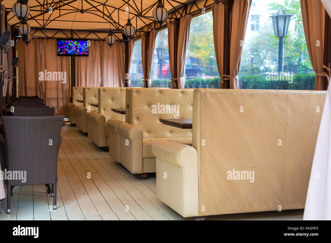 Interior of cafe in classical style with warm colors Stock Photo - Alamy