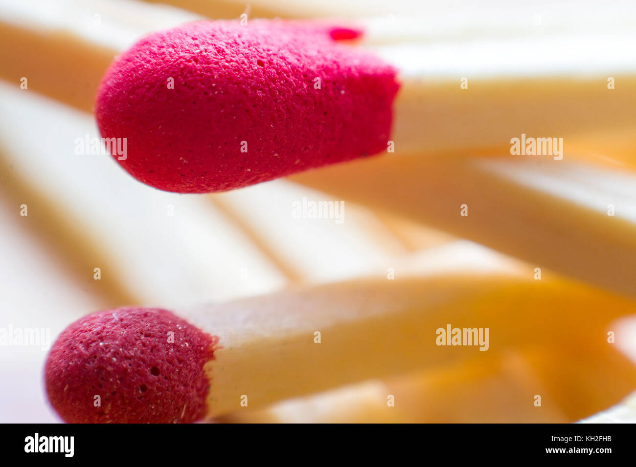Close-up detail image of two red matches Stock Photo - Alamy