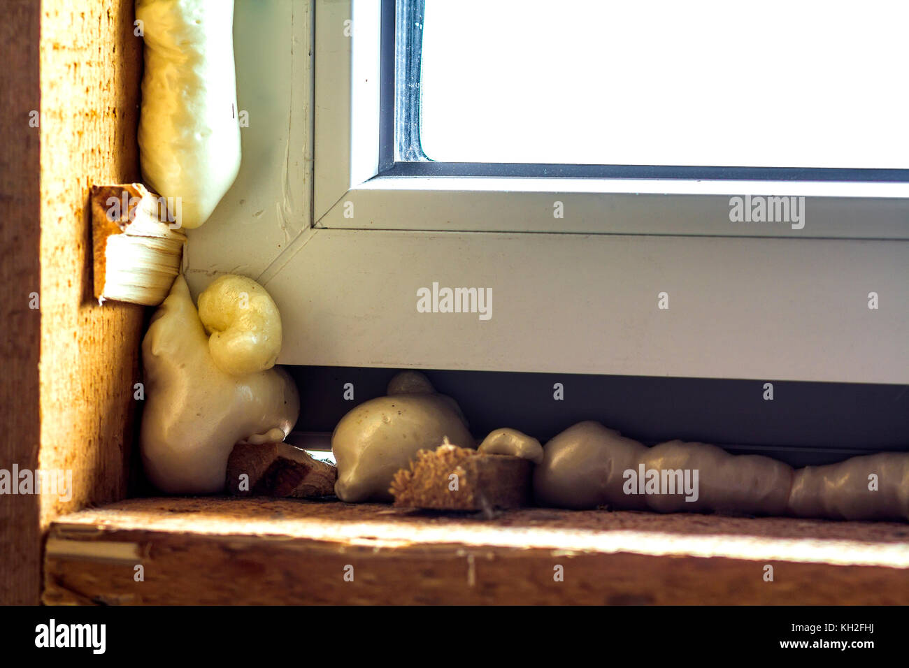 Close-up of new window installation with foam Stock Photo - Alamy