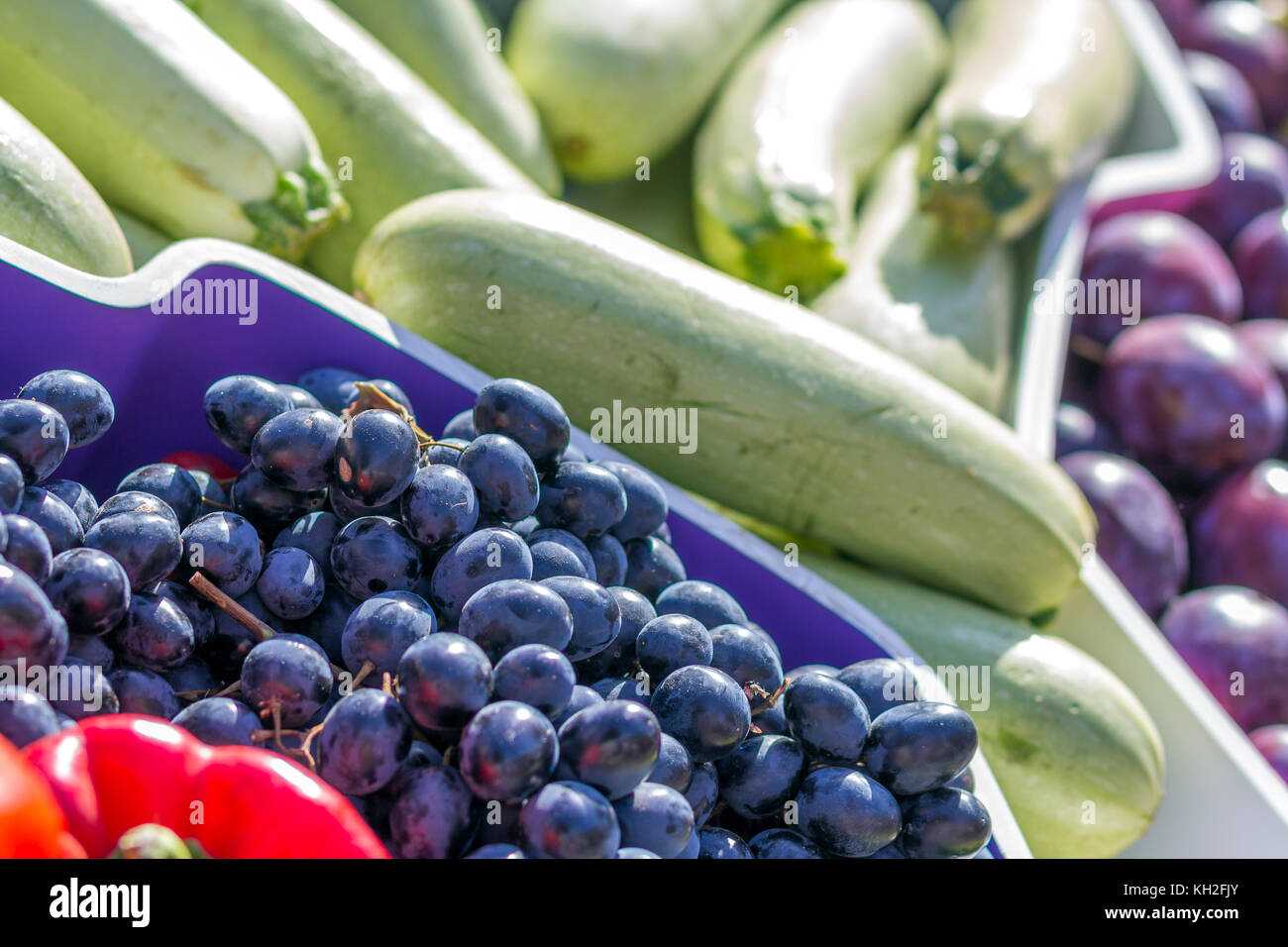 Farmers fruit market with various colorful fresh fruits and vegetables ...
