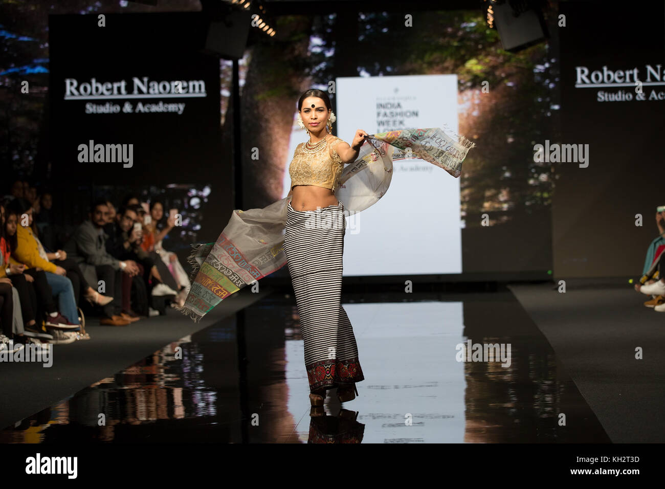 Models on catwalk showcasing existing and upcoming Indian designers ...