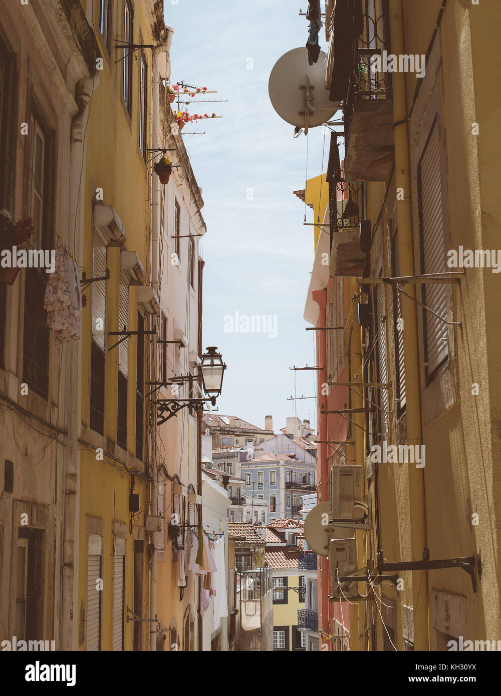 Beautiful narrow old street in Lisbon Stock Photo - Alamy