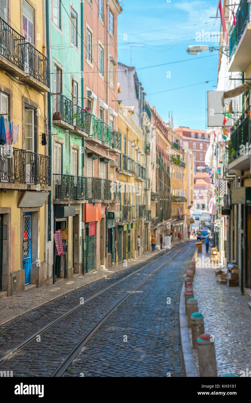 Beautiful narrow old street in Lisbon Stock Photo - Alamy