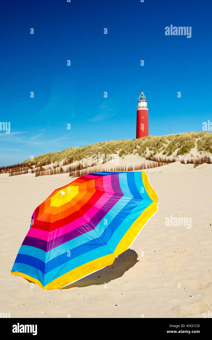 Colorful parasol at the summer beach Stock Photo - Alamy