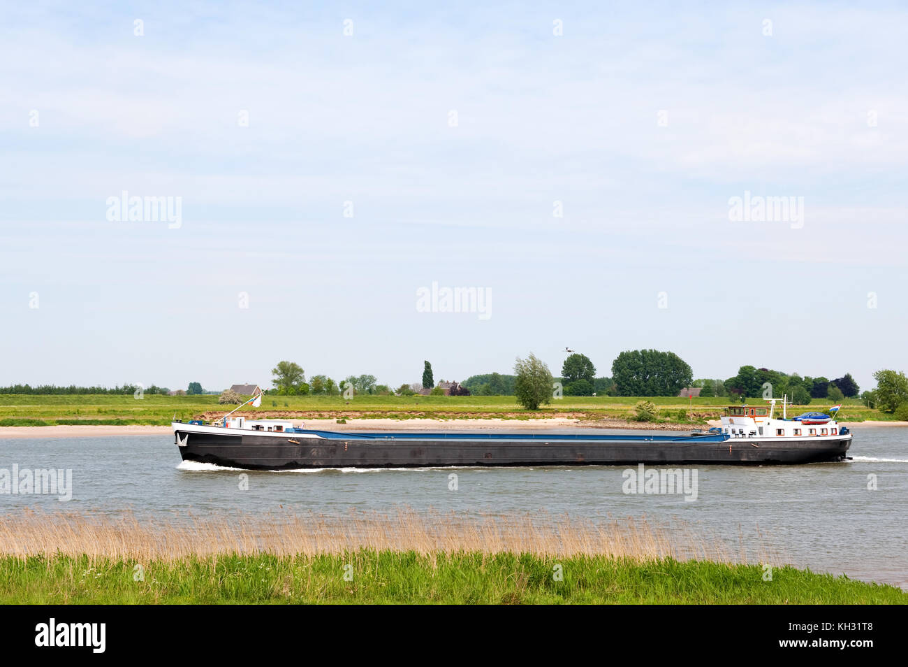 Big boat at the Dutch river the Lek Stock Photo - Alamy