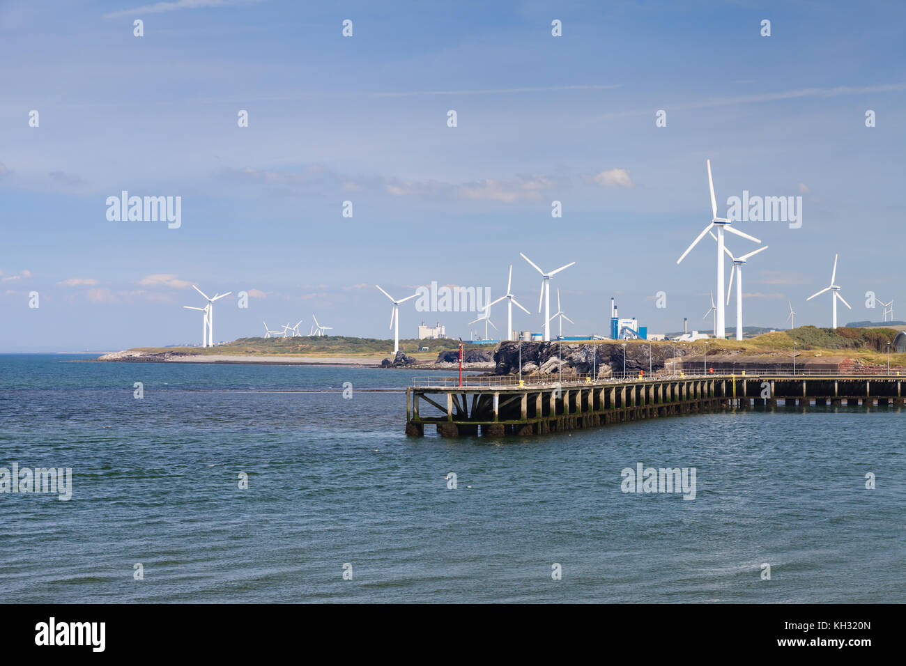 The view across the River Derwent to wind turbines in Workington, North ...