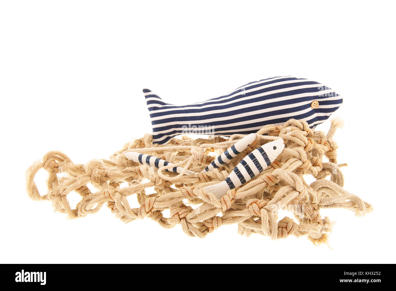 Fishing net with artificial fish isolated over white background Stock ...