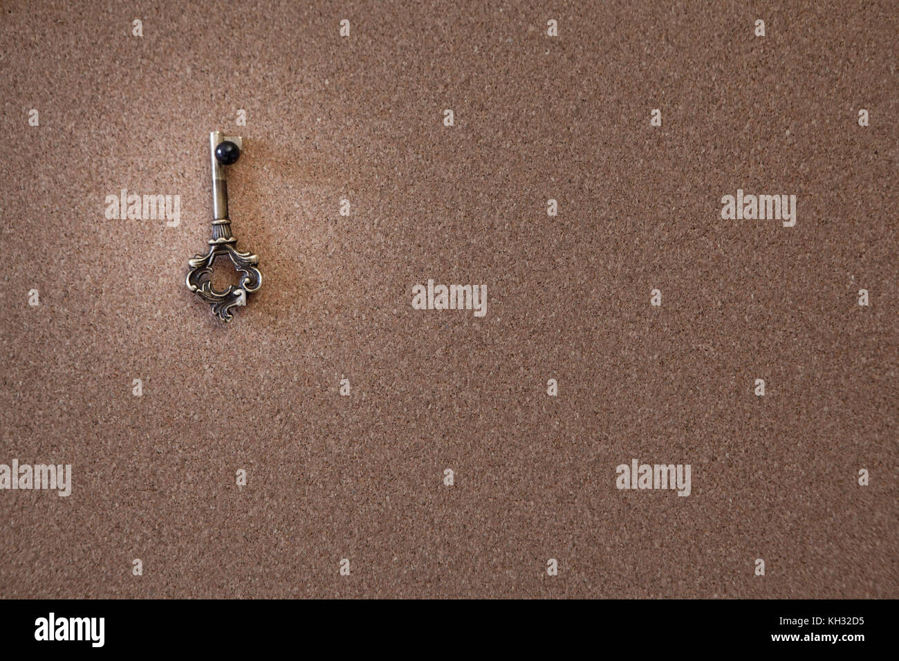 old key on a cork board Stock Photo - Alamy