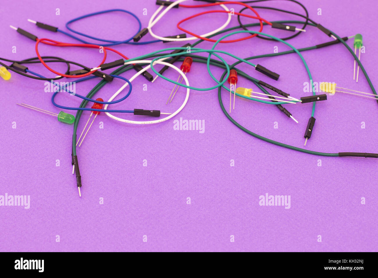 Set of colorful cables on violet background Stock Photo - Alamy