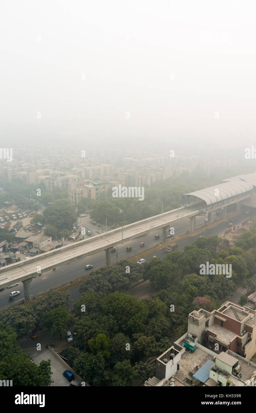 Vertical shot with smog covered metro line in Noida Stock Photo - Alamy