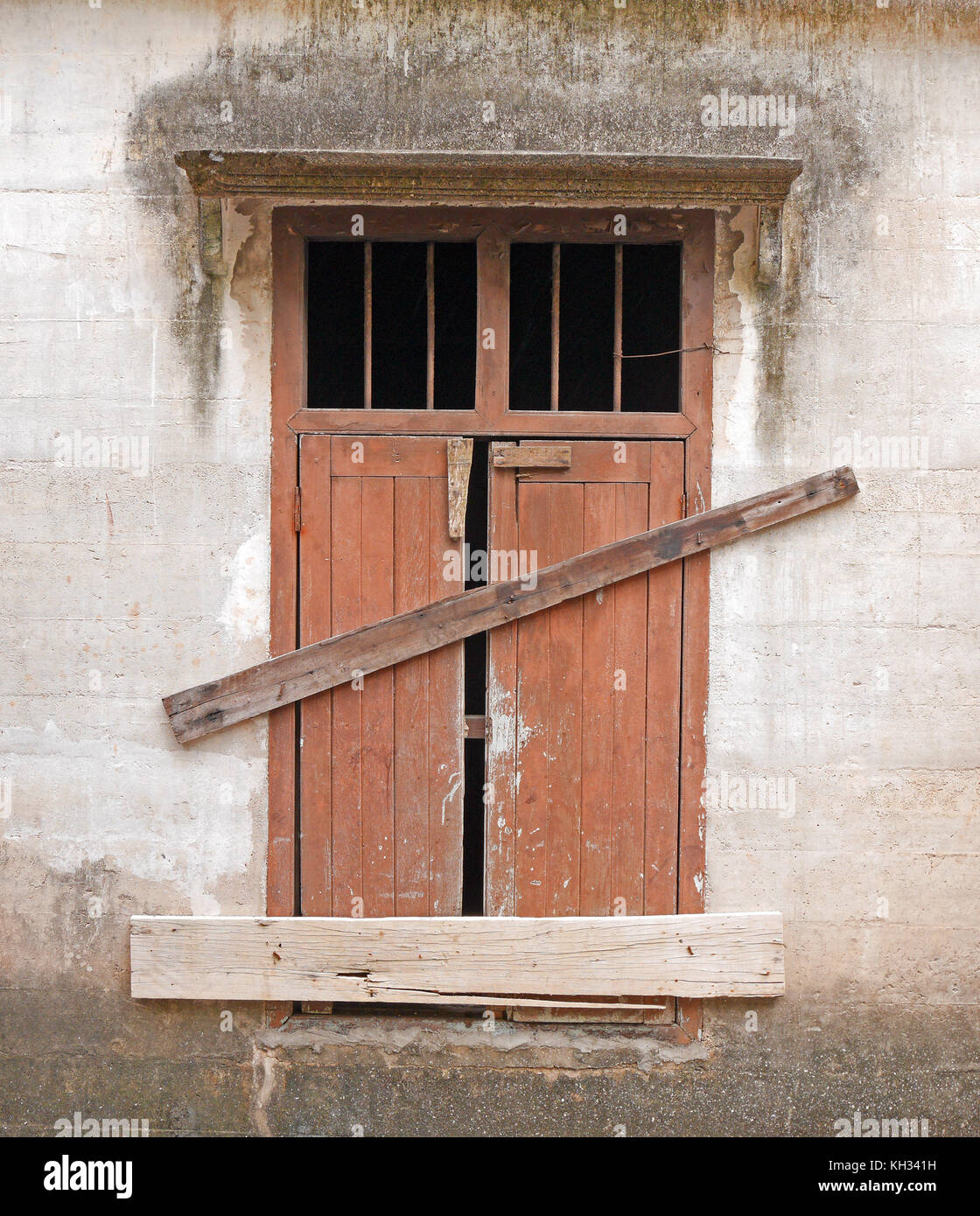 Old window locked from outside Stock Photo - Alamy