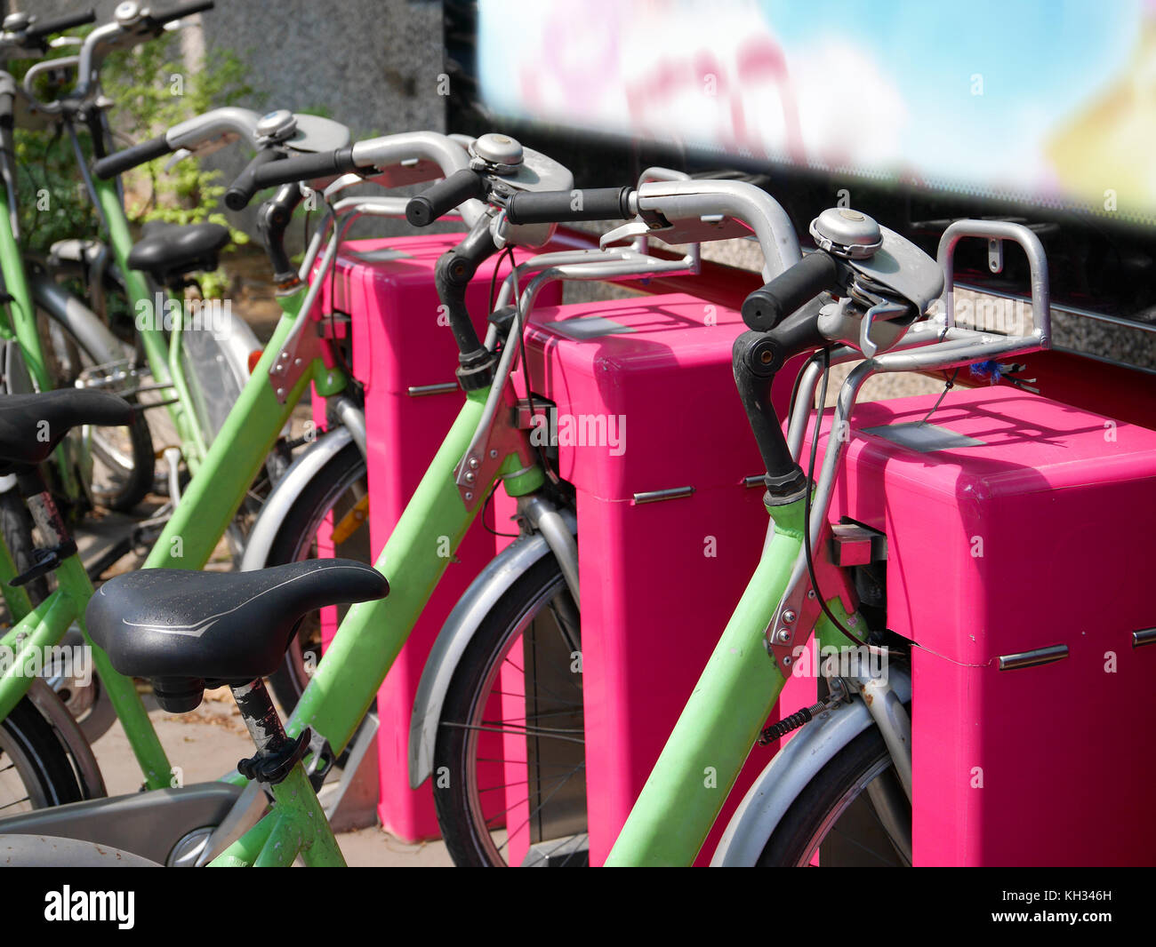 Green free rental city bicycles Stock Photo - Alamy