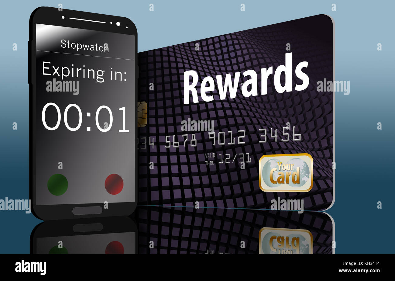A rewards credit card that has an expiration date is seen with a cell ...