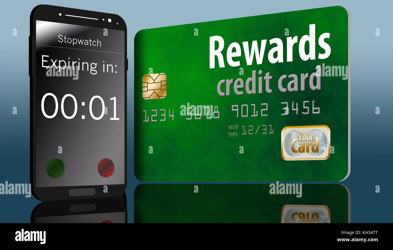 A rewards credit card that has an expiration date is seen with a cell ...