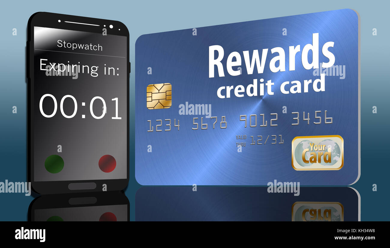 A rewards credit card that has an expiration date is seen with a cell ...