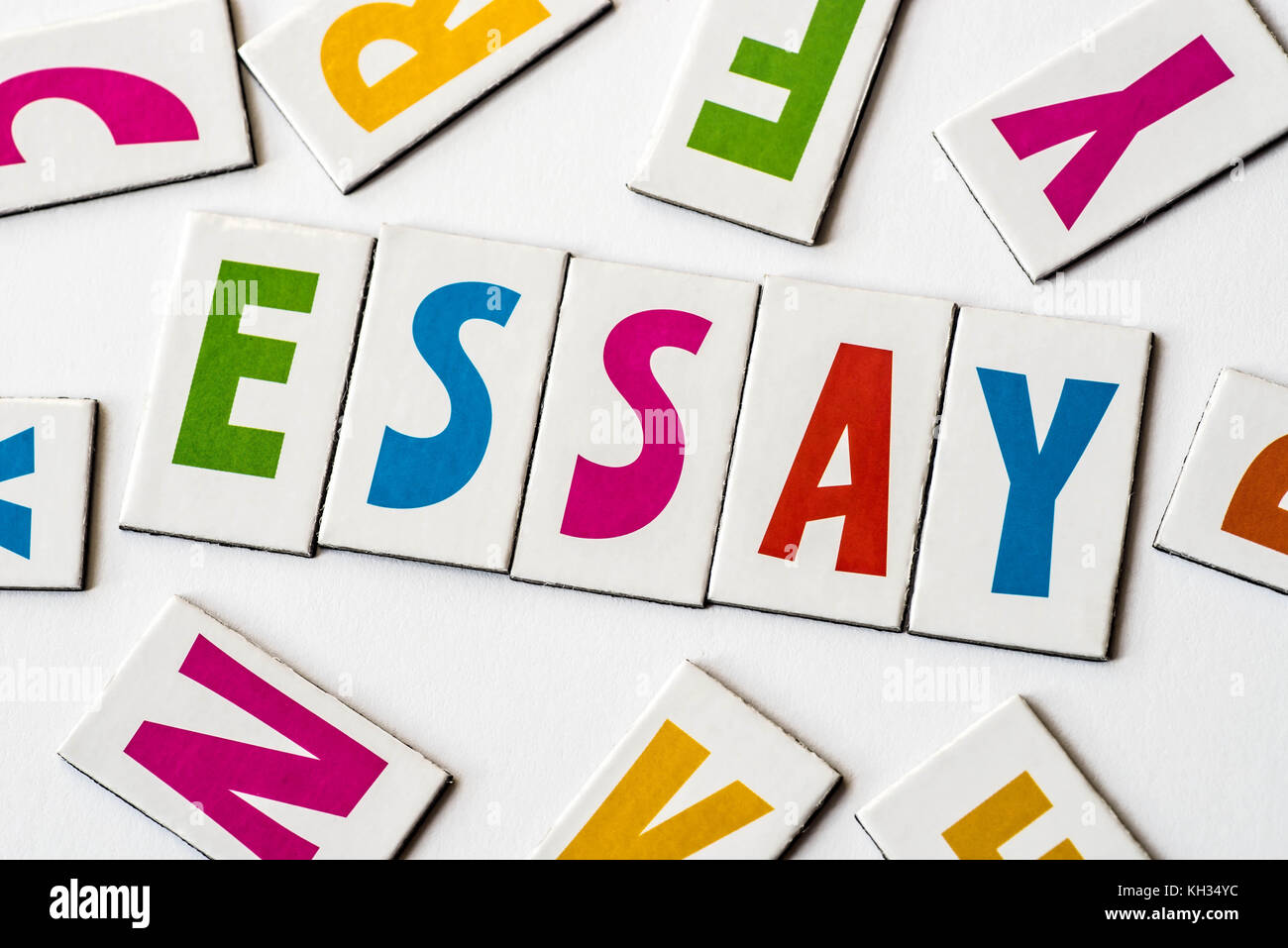 word essay made of colorful letters on white background Stock Photo - Alamy