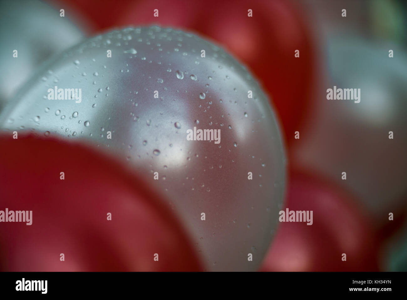 White and red balloons with rain drops Stock Photo - Alamy