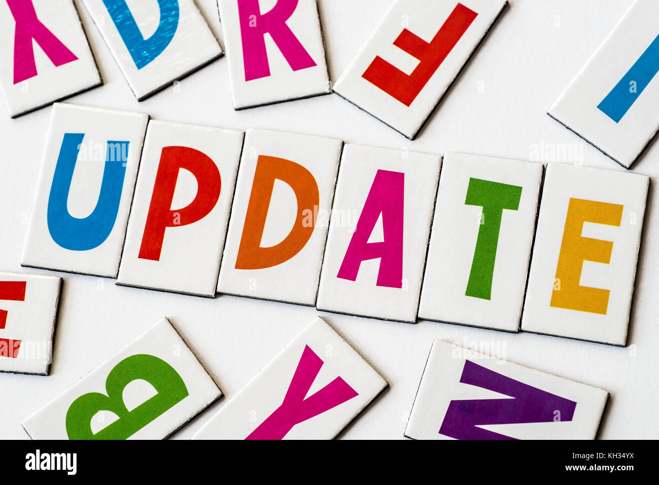 word update made of colorful letters on white background Stock Photo ...