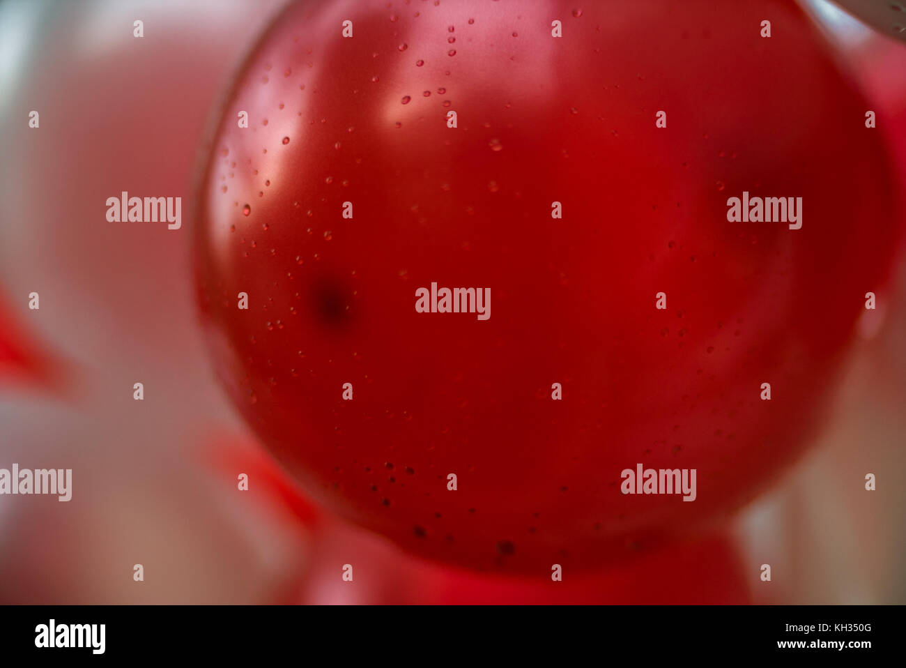 White and red balloons with rain drops Stock Photo - Alamy