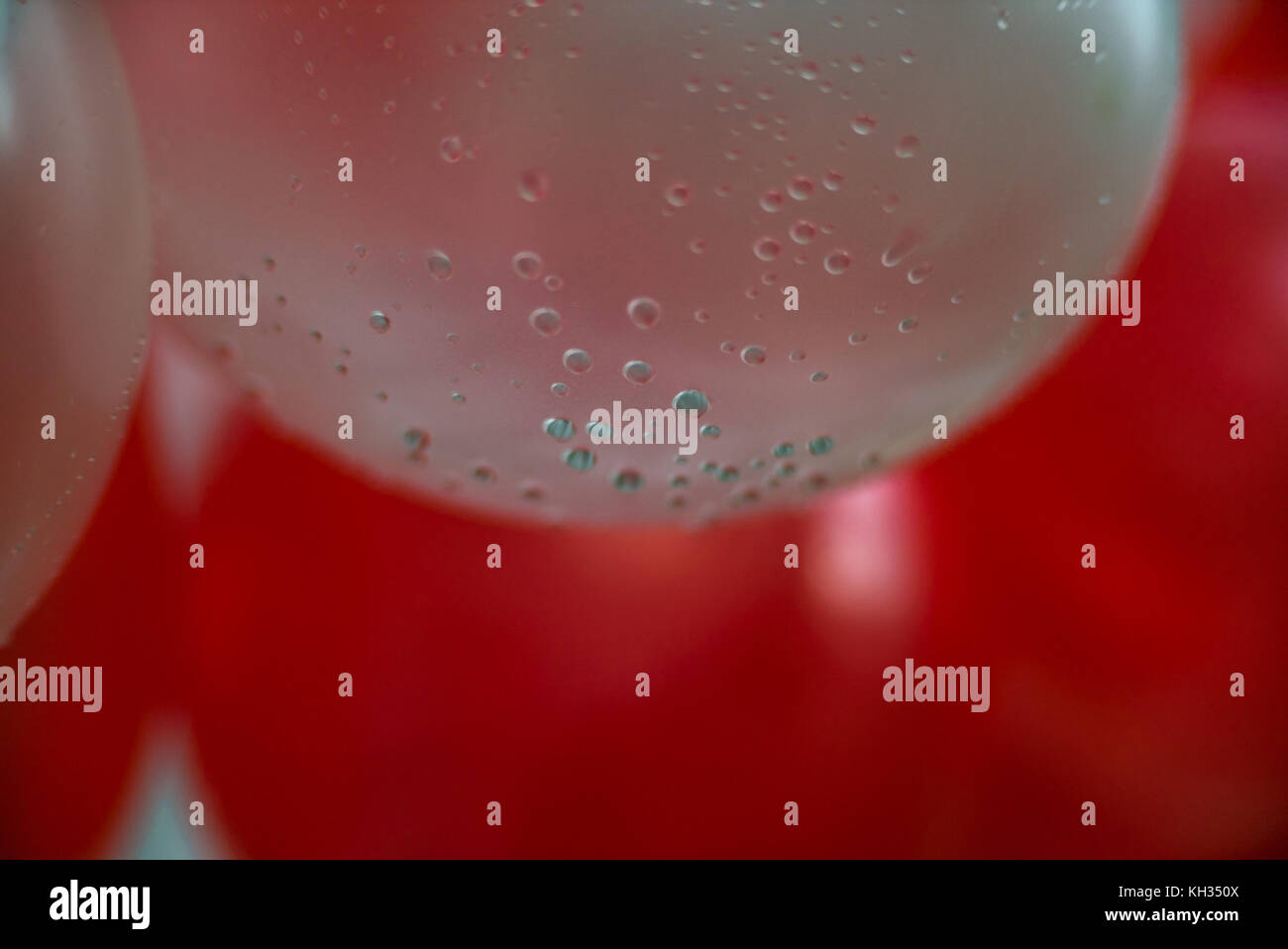 White and red balloons with rain drops Stock Photo - Alamy