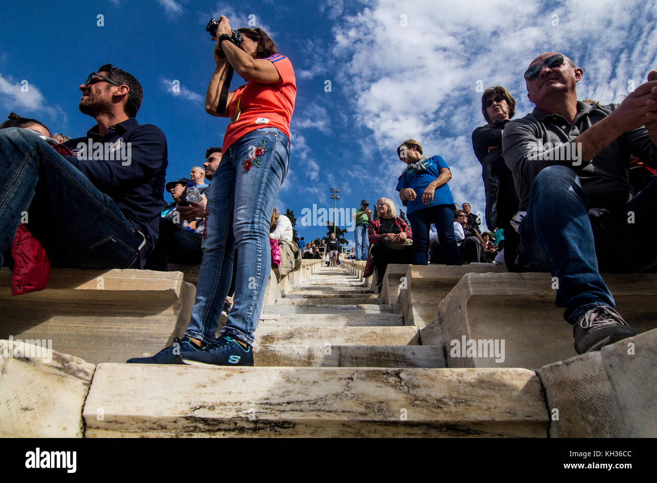 Athens, Greece. 12th Nov, 2017. Spectators watch the athletes to enter ...