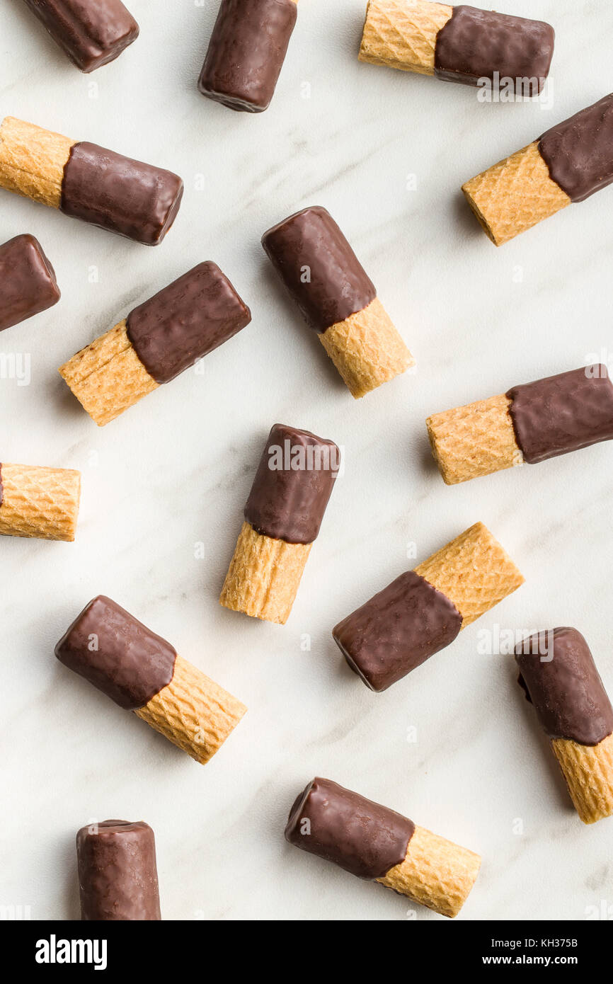 Sweet dessert. Biscuits rolls with chocolate icing. Top view Stock ...