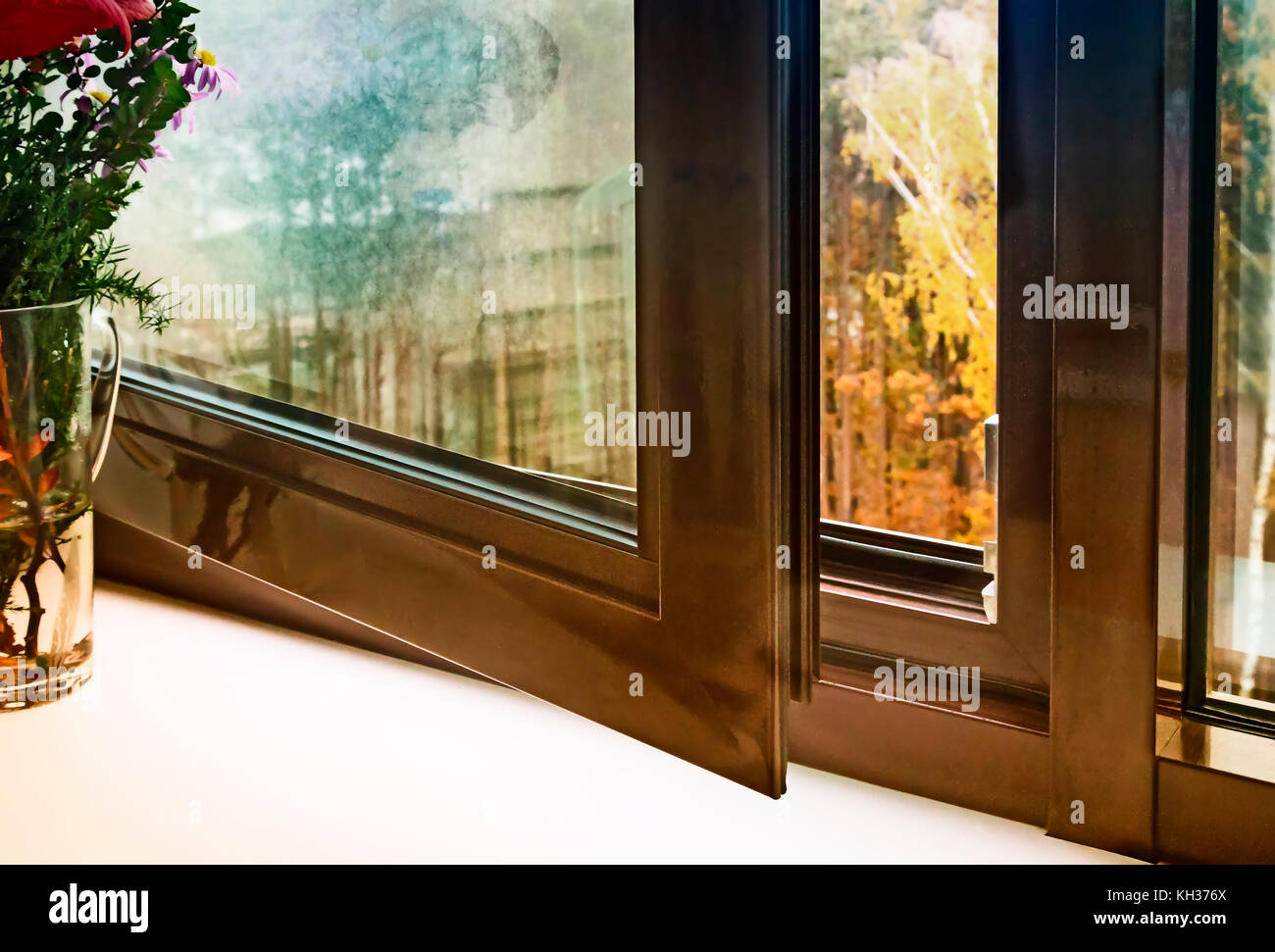 Open window with brown frames and views of autumn landscape Stock Photo ...