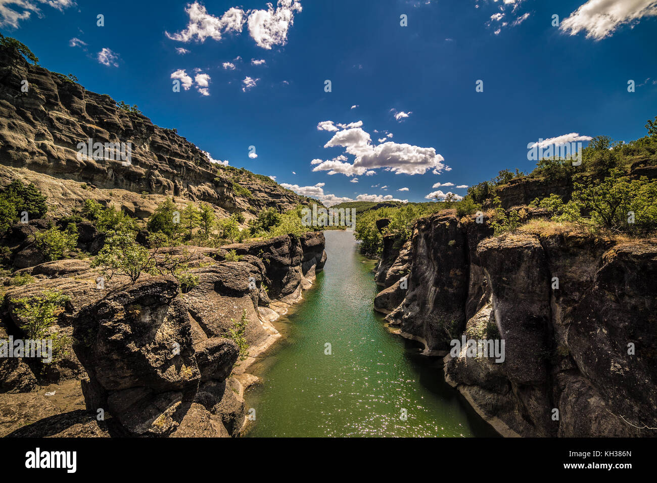 Tranquil Nature Scene of small river and rocks Stock Photo - Alamy