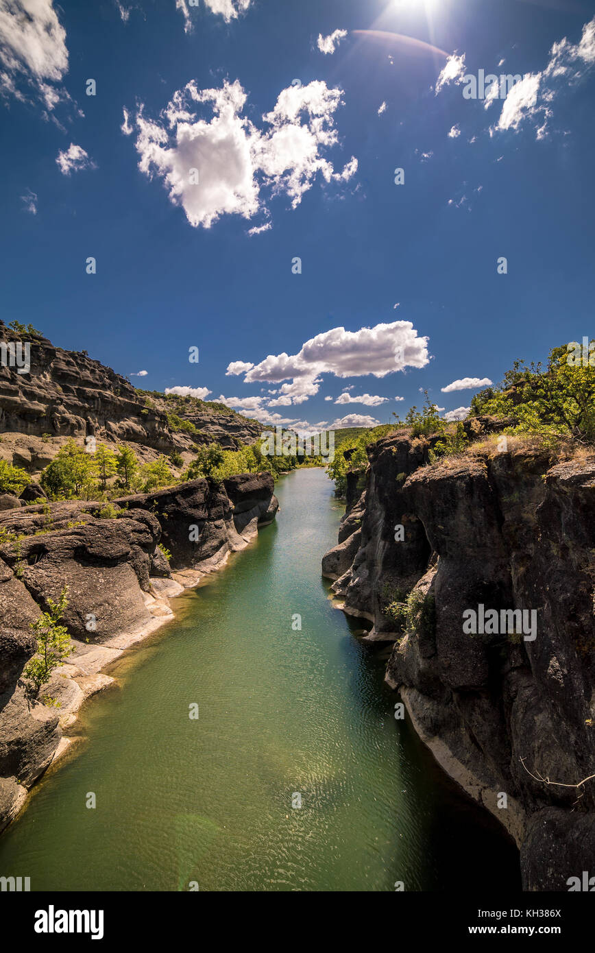 Tranquil Nature Scene of small river and rocks Stock Photo - Alamy