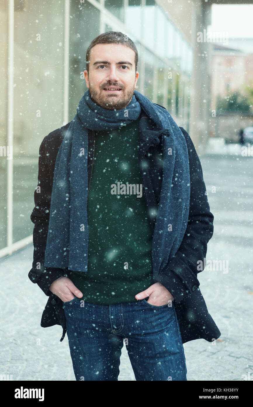 Portrait of a man in cold snowy day Stock Photo - Alamy