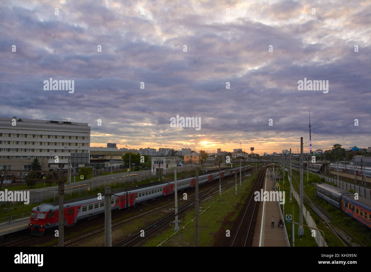 Cityscape with many railway tracks and movement of commuter passenger ...