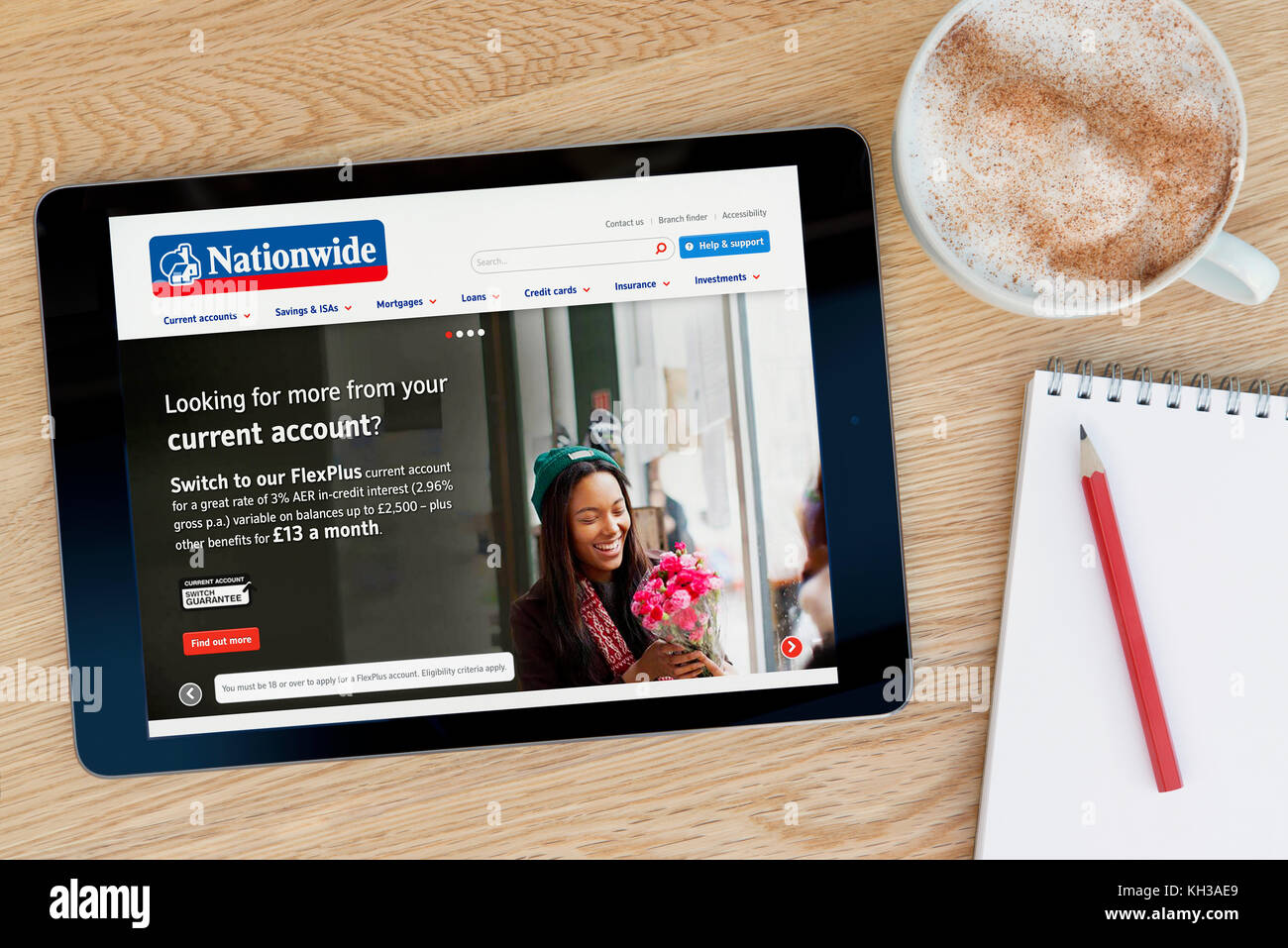 The Nationwide website features on an iPad tablet device which rests on ...