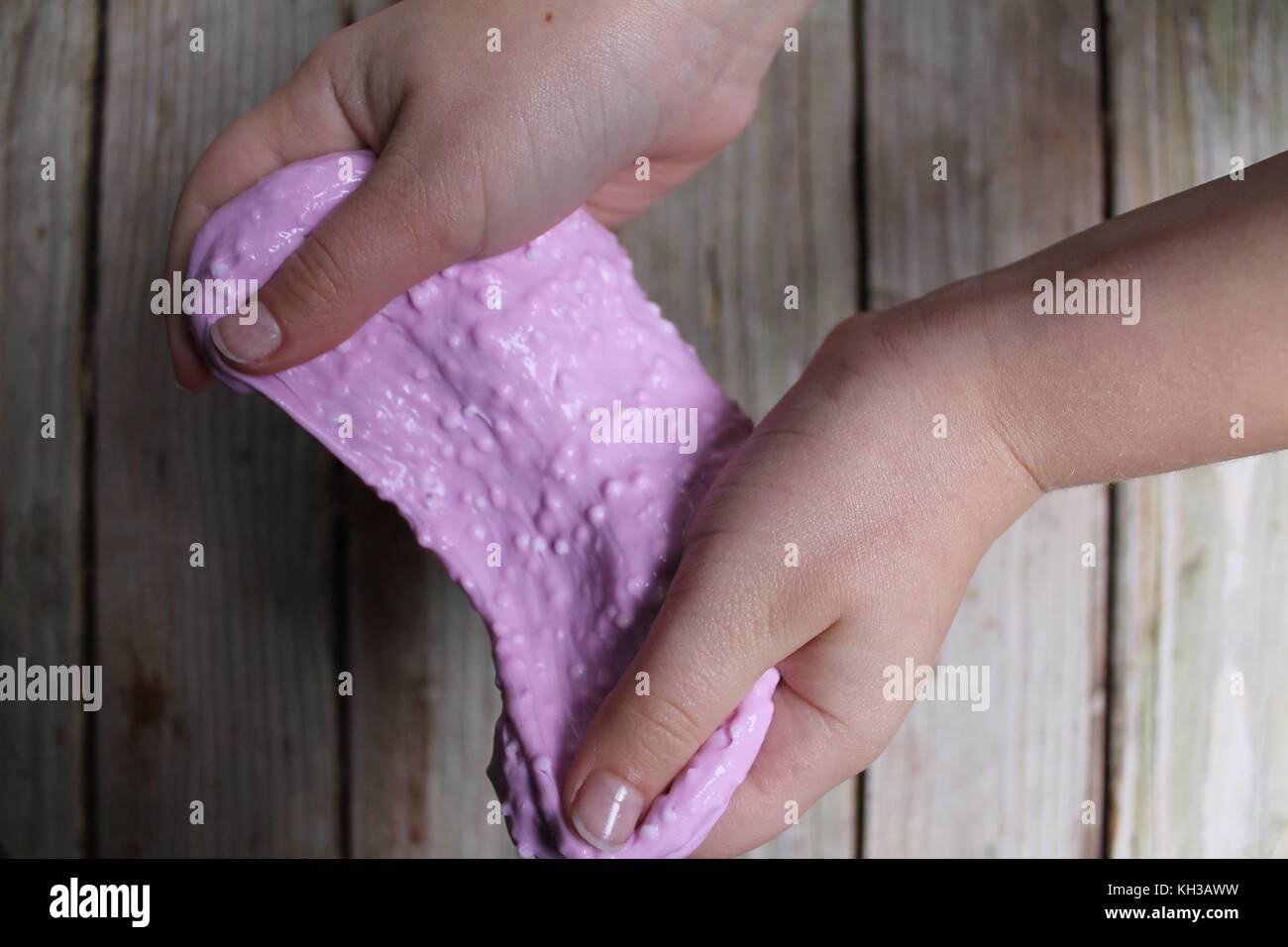 slime in child's hands Stock Photo - Alamy
