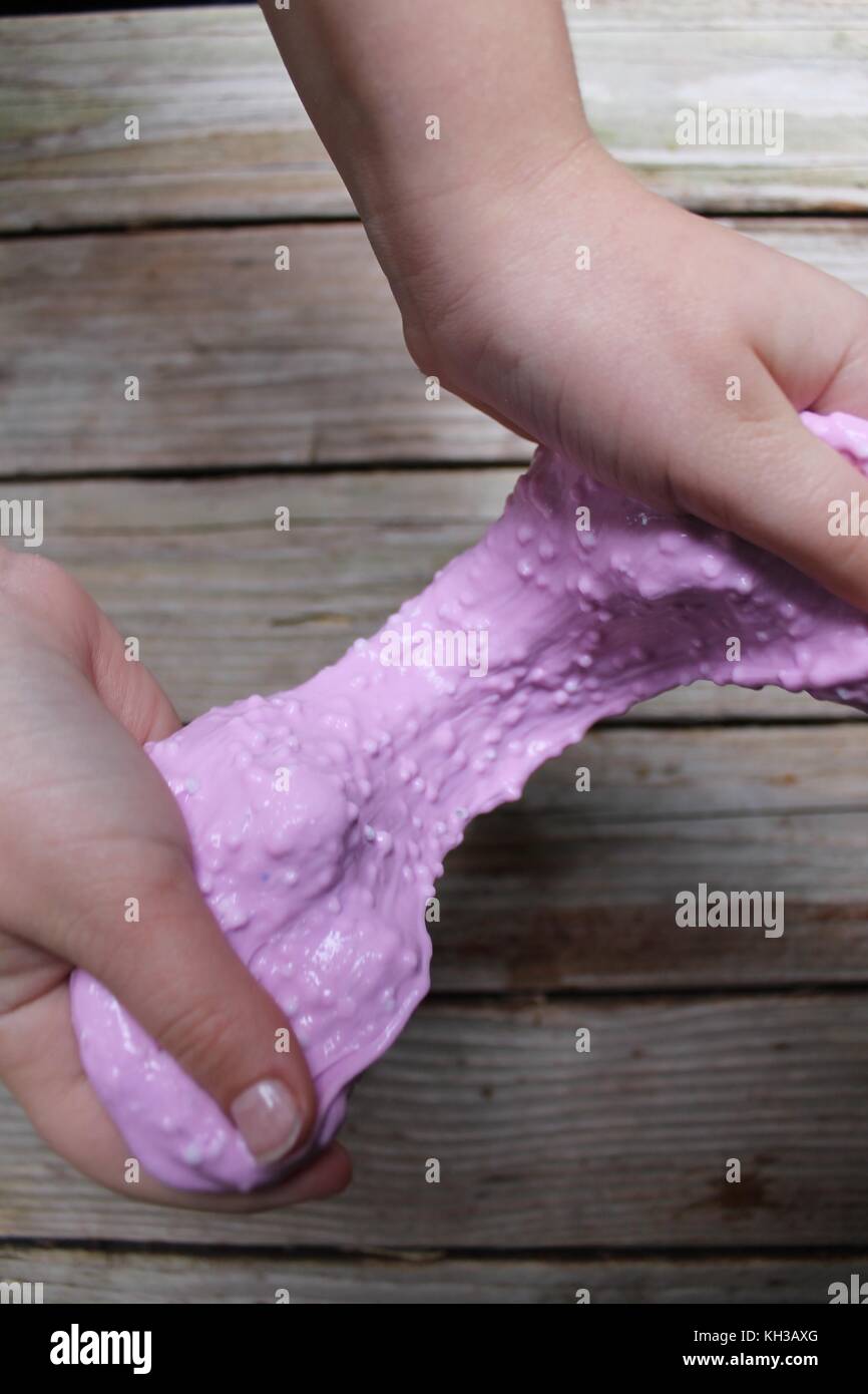 slime in child's hands Stock Photo - Alamy