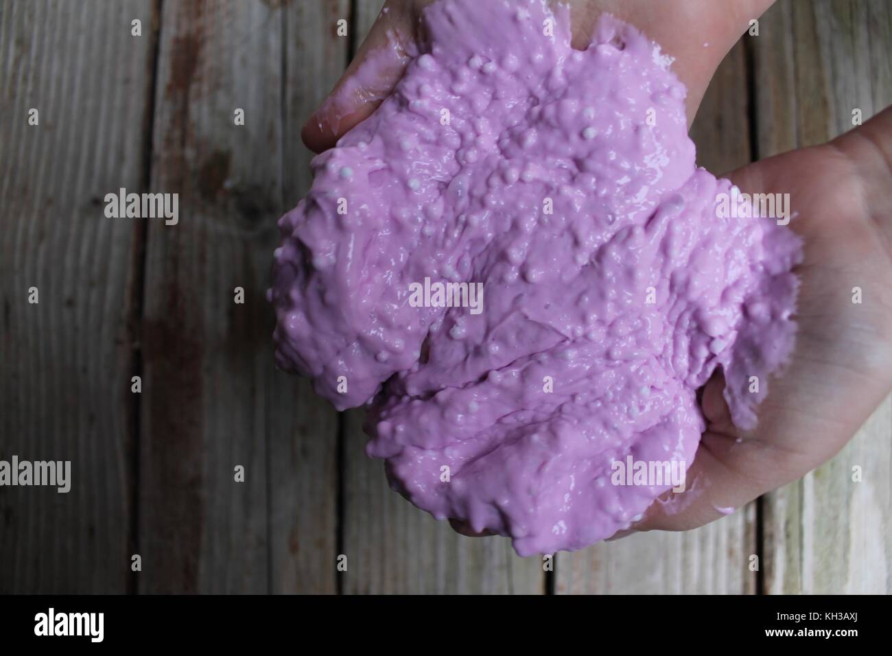 slime in child's hands Stock Photo - Alamy