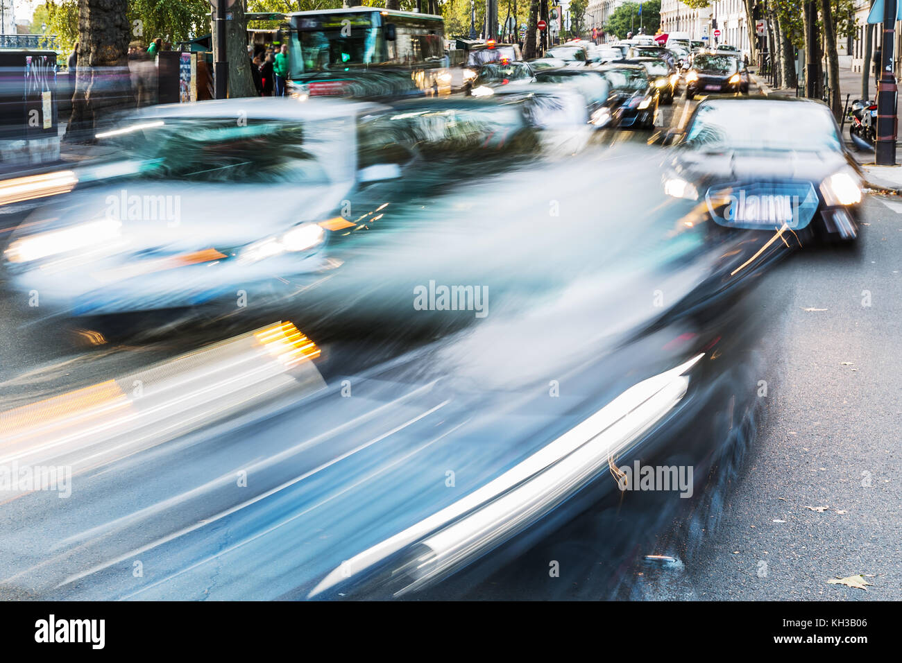 busy car traffic on a Parisian street in motion blur Stock Photo - Alamy